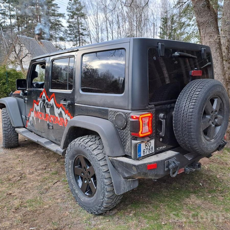 Black Jeep Wrangler 2012 in Riga, with an engine capacity of 2.80 L and mileage of 0 thousand km for 20950 €, photo 6 on AUTOMOTO.COM.LV