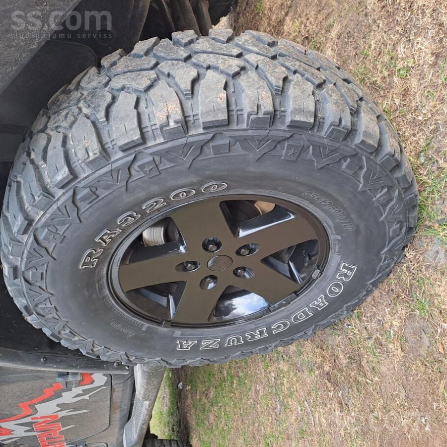 Black Jeep Wrangler 2012 in Riga, with an engine capacity of 2.80 L and mileage of 0 thousand km for 20950 €, photo 7 on AUTOMOTO.COM.LV