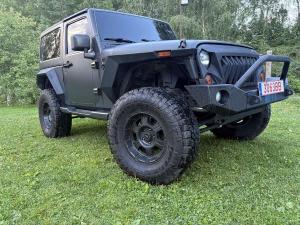 Melns Jeep Wrangler 2012 Viļņa, ar dzinēja tilpumu 3.60 L un nobraukumu 130 tūkst. km par 17500 €, foto  vietnē AUTOMOTO.COM.LV