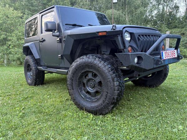 Black Jeep Wrangler 2012 in Vilnius, with an engine capacity of 3.60 L and mileage of 130 thousand km for 17500 €, photo 1 on AUTOMOTO.COM.LV