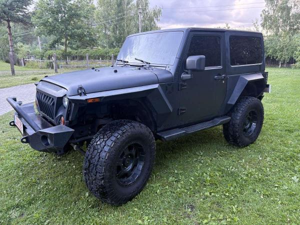 Black Jeep Wrangler 2012 in Vilnius, with an engine capacity of 3.60 L and mileage of 130 thousand km for 17500 €, photo 2 on AUTOMOTO.COM.LV