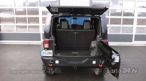 Melns Jeep Wrangler 2012 Tallina, ar dzinēja tilpumu 2.80 L un nobraukumu 132 tūkst. km par 25000 €, foto 14 vietnē AUTOMOTO.COM.LV