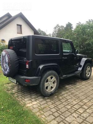 Black Jeep Wrangler 2012 in Riga, with an engine capacity of 2.80 L and mileage of 230 thousand km for 19880 €, photo 3 on AUTOMOTO.COM.LV