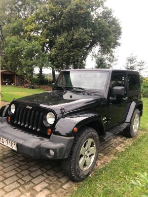 Black Jeep Wrangler 2012 in Riga, with an engine capacity of 2.80 L and mileage of 230 thousand km for 19880 €, photo 10 on AUTOMOTO.COM.LV