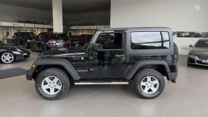 Melns Jeep Wrangler 2012 Marijampole, ar dzinēja tilpumu 3.60 L un nobraukumu 101 tūkst. km par 16999 €, foto 3 vietnē AUTOMOTO.COM.LV