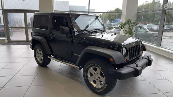 Melns Jeep Wrangler 2012 Marijampole, ar dzinēja tilpumu 3.60 L un nobraukumu 101 tūkst. km par 16999 €, foto 8 vietnē AUTOMOTO.COM.LV