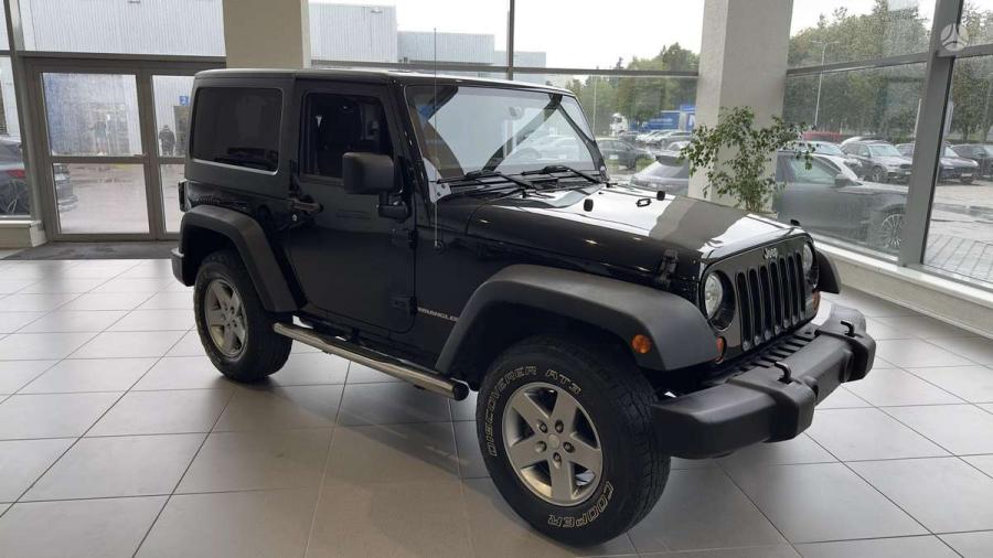 Melns Jeep Wrangler 2012 Marijampole, ar dzinēja tilpumu 3.60 L un nobraukumu 101 tūkst. km par 16999 €, foto 8 vietnē AUTOMOTO.COM.LV
