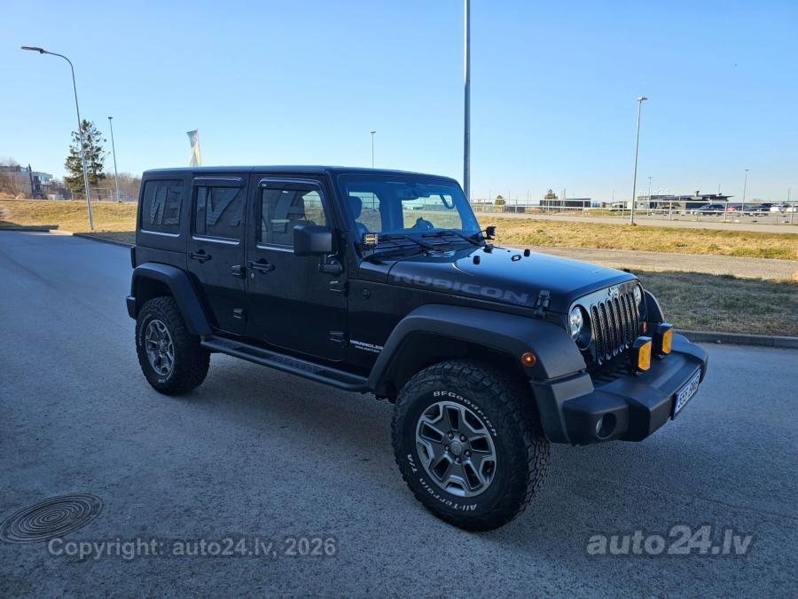 Black Jeep Wrangler 2013 in Tallinn, with an engine capacity of 2.80 L and mileage of 112 thousand km for 25900 €, photo 5 on AUTOMOTO.COM.LV