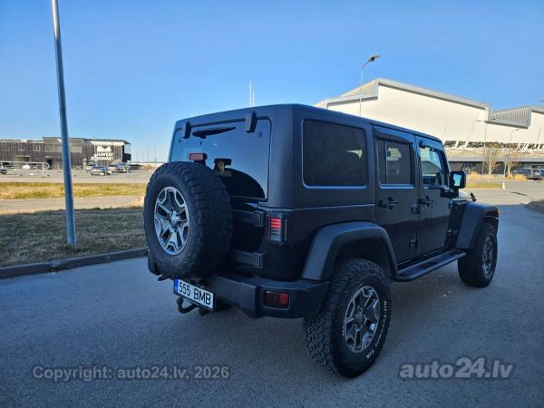 Black Jeep Wrangler 2013 in Tallinn, with an engine capacity of 2.80 L and mileage of 112 thousand km for 25900 €, photo 5 on AUTOMOTO.COM.LV