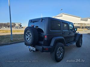 Black Jeep Wrangler 2013 in Tallinn, with an engine capacity of 2.80 L and mileage of 112 thousand km for 25900 €, photo 6 on AUTOMOTO.COM.LV