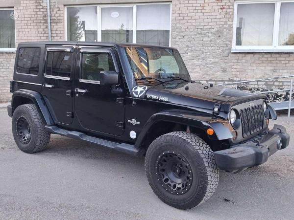 Black Jeep Wrangler 2013 in Klaipeda, with an engine capacity of 3.60 L and mileage of 206 thousand km for 12200 €, photo 4 on AUTOMOTO.COM.LV