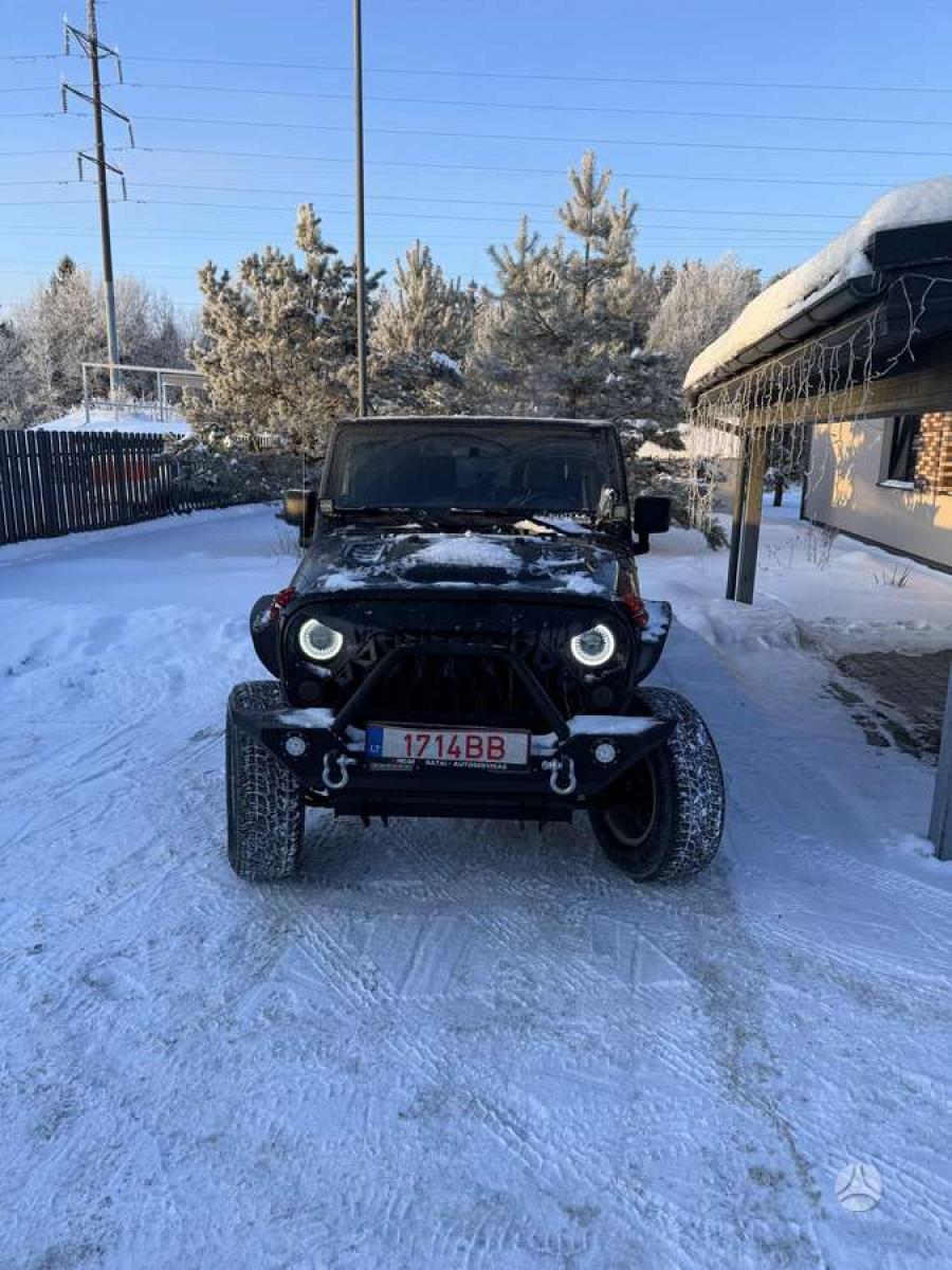 Melns Jeep Wrangler 2014 Viļņa, ar dzinēja tilpumu 3.60 L un nobraukumu 113 tūkst. km par 16500 €, foto 1 vietnē AUTOMOTO.COM.LV