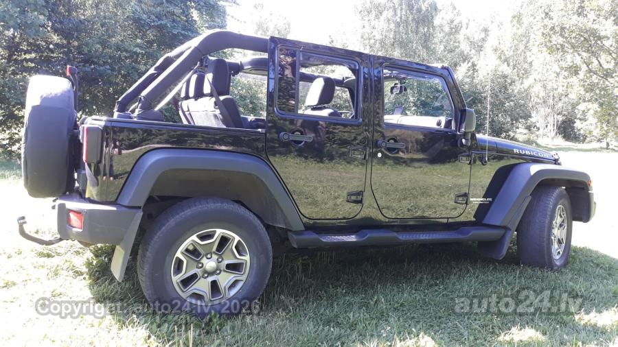 Melns Jeep Wrangler 2014 Tallina, ar dzinēja tilpumu 2.80 L un nobraukumu 139 tūkst. km par 24900 €, foto 4 vietnē AUTOMOTO.COM.LV
