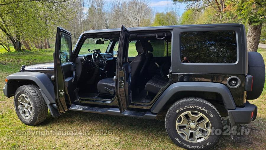 Melns Jeep Wrangler 2014 Tallina, ar dzinēja tilpumu 2.80 L un nobraukumu 139 tūkst. km par 24900 €, foto 14 vietnē AUTOMOTO.COM.LV