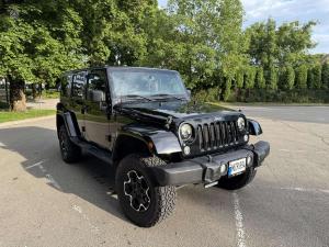 Black Jeep Wrangler 2015 in Taurage, with an engine capacity of 3.60 L and mileage of 155 thousand km for 15450 €, photo  on AUTOMOTO.COM.LV