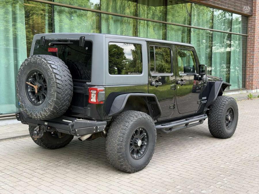 Black Jeep Wrangler 2016 in Kaunas, with an engine capacity of 3.60 L and mileage of 190 thousand km for 17600 €, photo 4 on AUTOMOTO.COM.LV