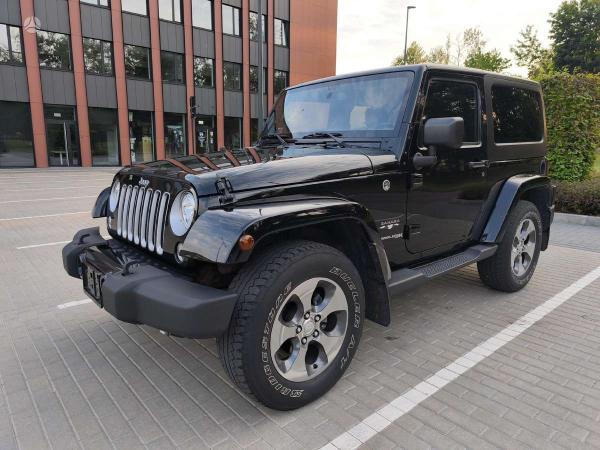 Black Jeep Wrangler 2018 in Vilnius, with an engine capacity of 3.60 L and mileage of 96 thousand km for 23500 €, photo 11 on AUTOMOTO.COM.LV