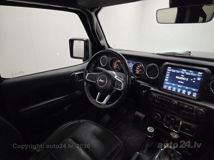 Black Jeep Wrangler 2020 in Tallinn, with an engine capacity of 2.00 L and mileage of 176 thousand km for 28900 €, photo 13 on AUTOMOTO.COM.LV