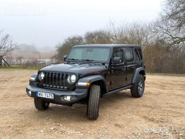 Black Jeep Wrangler 2021 in Liepaja, with an engine capacity of 2.00 L and mileage of 63 thousand km for 44999 €, photo 2 on AUTOMOTO.COM.LV