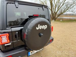 Black Jeep Wrangler 2021 in Liepaja, with an engine capacity of 2.00 L and mileage of 63 thousand km for 44999 €, photo 17 on AUTOMOTO.COM.LV