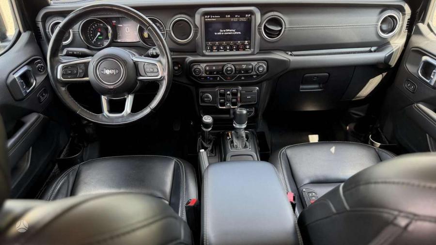 Black Jeep Wrangler 2021 in Vilnius, with an engine capacity of 2.00 L and mileage of 90 thousand km for 35000 €, photo 23 on AUTOMOTO.COM.LV