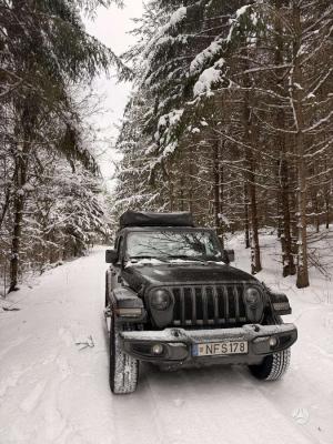 Melns Jeep Wrangler 2021 Kauņa, ar dzinēja tilpumu 2.00 L un nobraukumu 109 tūkst. km par 32999 €, foto 5 vietnē AUTOMOTO.COM.LV