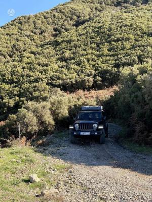 Melns Jeep Wrangler 2021 Kauņa, ar dzinēja tilpumu 2.00 L un nobraukumu 109 tūkst. km par 32999 €, foto 7 vietnē AUTOMOTO.COM.LV