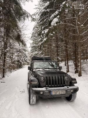 Black Jeep Wrangler 2021 in Kaunas, with an engine capacity of 2.00 L and mileage of 109 thousand km for 32899 €, photo 6 on AUTOMOTO.COM.LV