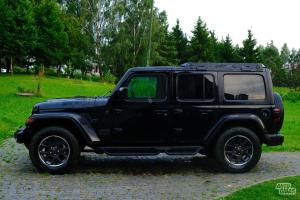 Black Jeep Wrangler 2021 in Kaunas, with an engine capacity of 2.00 L and mileage of 109 thousand km for 32899 €, photo 14 on AUTOMOTO.COM.LV
