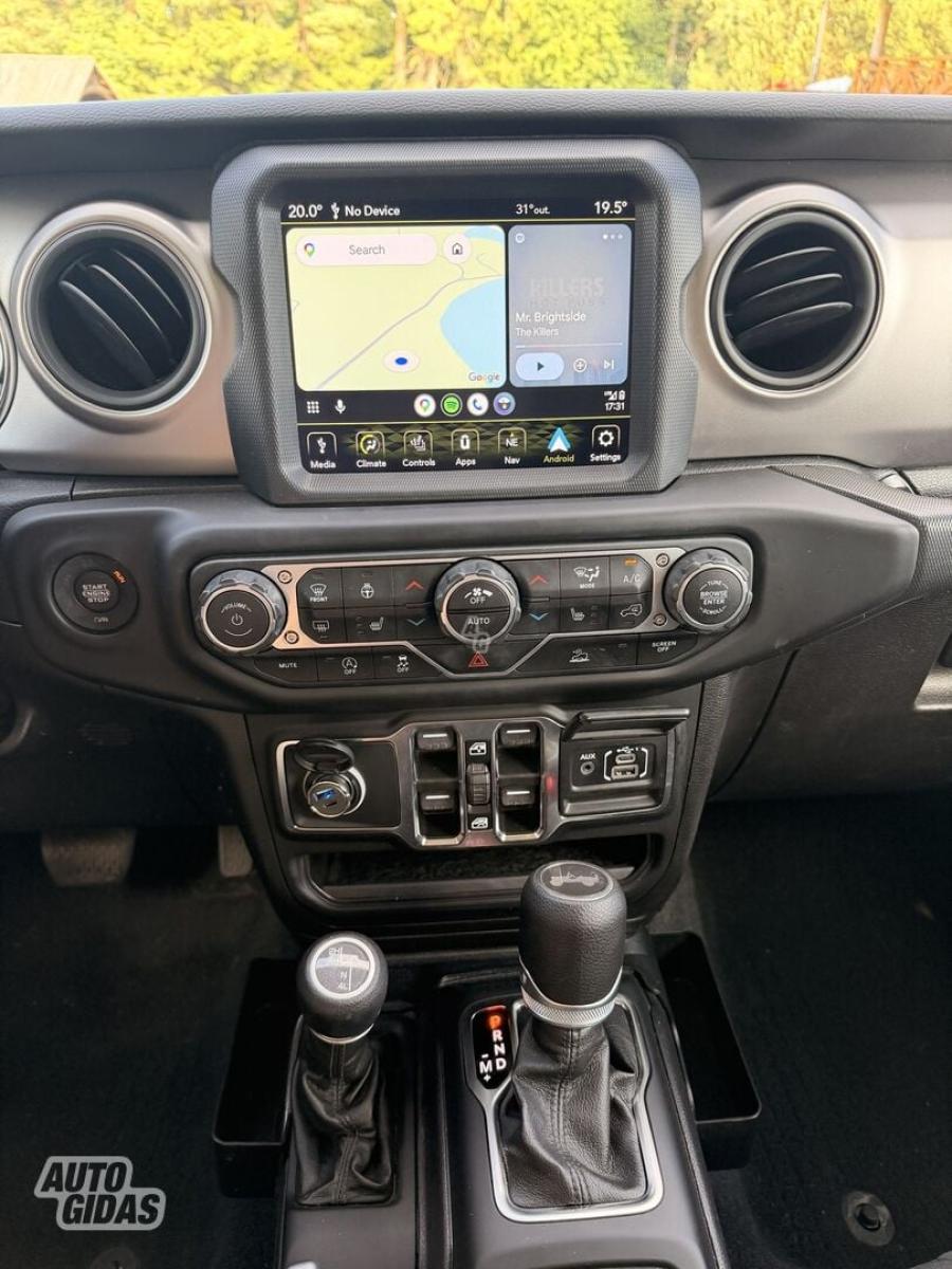 Black Jeep Wrangler 2021 in Kaunas, with an engine capacity of 2.00 L and mileage of 109 thousand km for 32899 €, photo 21 on AUTOMOTO.COM.LV