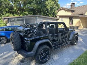 Melns Jeep Wrangler 2021 Rīga, ar dzinēja tilpumu 3.00 L un nobraukumu 70 tūkst. km par 36500 €, foto 6 vietnē AUTOMOTO.COM.LV