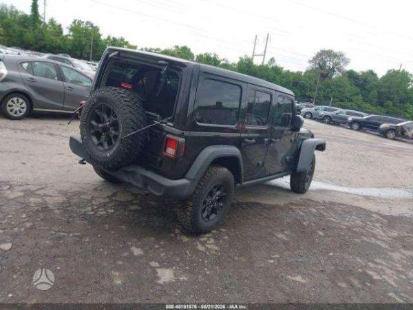 Black Jeep Wrangler 2023 in Klaipeda, with an engine capacity of 2.00 L and mileage of 50 thousand km for 13700 €, photo 4 on AUTOMOTO.COM.LV
