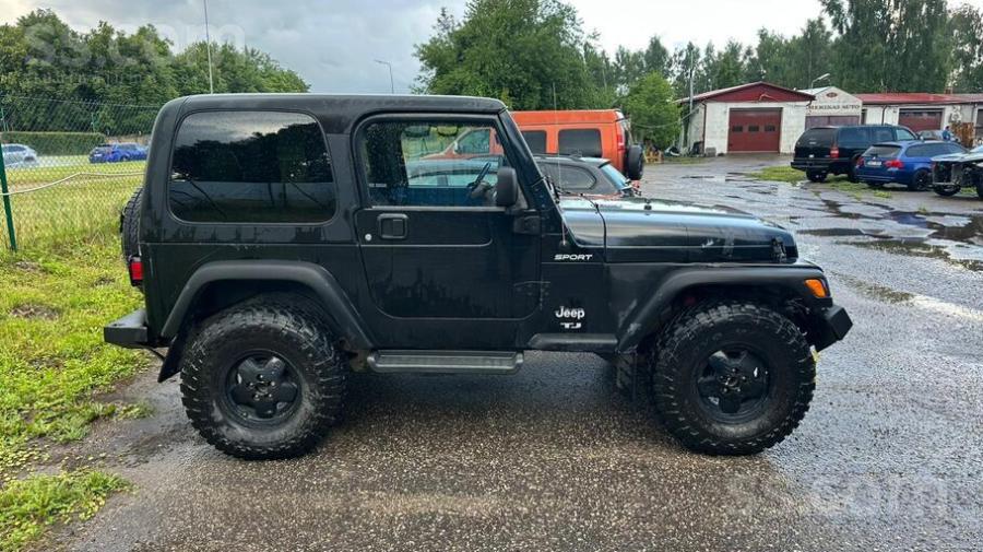 Melns Jeep Wrangler 2004 Rīga, ar dzinēja tilpumu 4.00 L un nobraukumu 204 tūkst. km par 6900 €, foto 3 vietnē AUTOMOTO.COM.LV