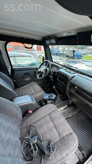 Melns Jeep Wrangler 2004 Rīga, ar dzinēja tilpumu 4.00 L un nobraukumu 204 tūkst. km par 6900 €, foto 7 vietnē AUTOMOTO.COM.LV