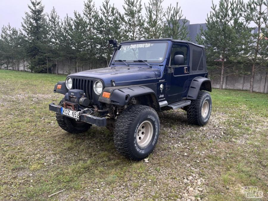 Zils Jeep Wrangler 2004 Mažeikiai, ar dzinēja tilpumu 4.00 L un nobraukumu 175 tūkst. km par 7500 €, foto 1 vietnē AUTOMOTO.COM.LV