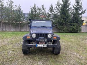 Zils Jeep Wrangler 2004 Mažeikiai, ar dzinēja tilpumu 4.00 L un nobraukumu 175 tūkst. km par 7500 €, foto 3 vietnē AUTOMOTO.COM.LV