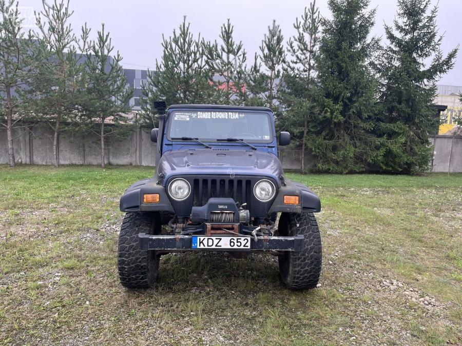 Zils Jeep Wrangler 2004 Mažeikiai, ar dzinēja tilpumu 4.00 L un nobraukumu 175 tūkst. km par 7500 €, foto 3 vietnē AUTOMOTO.COM.LV