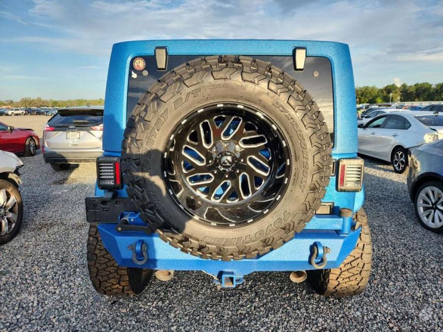Blue Jeep Wrangler 2016 in Vilnius, with an engine capacity of 3.60 L and mileage of 40 thousand km for 21000 €, photo 7 on AUTOMOTO.COM.LV