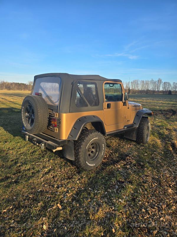 Brūns Jeep Wrangler 1997 Tallina, ar dzinēja tilpumu 5.20 L un nobraukumu 147 tūkst. km par 31000 €, foto 2 vietnē AUTOMOTO.COM.LV
