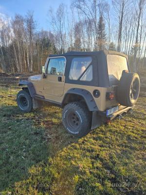 Brūns Jeep Wrangler 1997 Tallina, ar dzinēja tilpumu 5.20 L un nobraukumu 147 tūkst. km par 31000 €, foto 4 vietnē AUTOMOTO.COM.LV