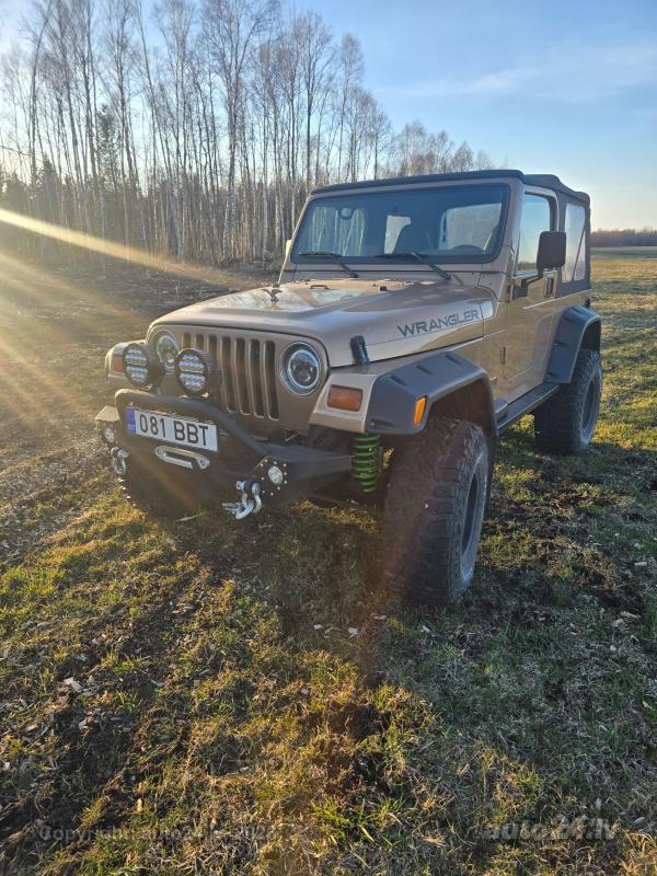 Brūns Jeep Wrangler 1997 Tallina, ar dzinēja tilpumu 5.20 L un nobraukumu 147 tūkst. km par 31000 €, foto 4 vietnē AUTOMOTO.COM.LV