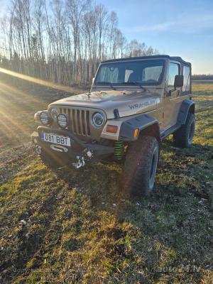 Brūns Jeep Wrangler 1997 Tallina, ar dzinēja tilpumu 5.20 L un nobraukumu 147 tūkst. km par 31000 €, foto 5 vietnē AUTOMOTO.COM.LV