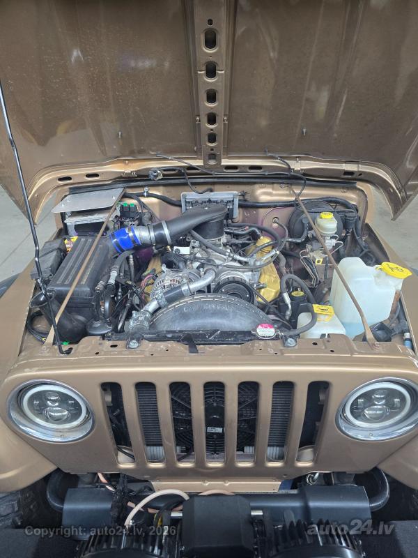 Brūns Jeep Wrangler 1997 Tallina, ar dzinēja tilpumu 5.20 L un nobraukumu 147 tūkst. km par 31000 €, foto 8 vietnē AUTOMOTO.COM.LV