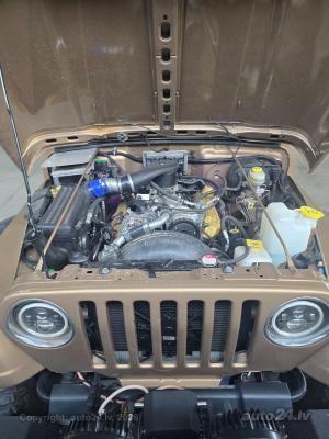 Brūns Jeep Wrangler 1997 Tallina, ar dzinēja tilpumu 5.20 L un nobraukumu 147 tūkst. km par 31000 €, foto 9 vietnē AUTOMOTO.COM.LV