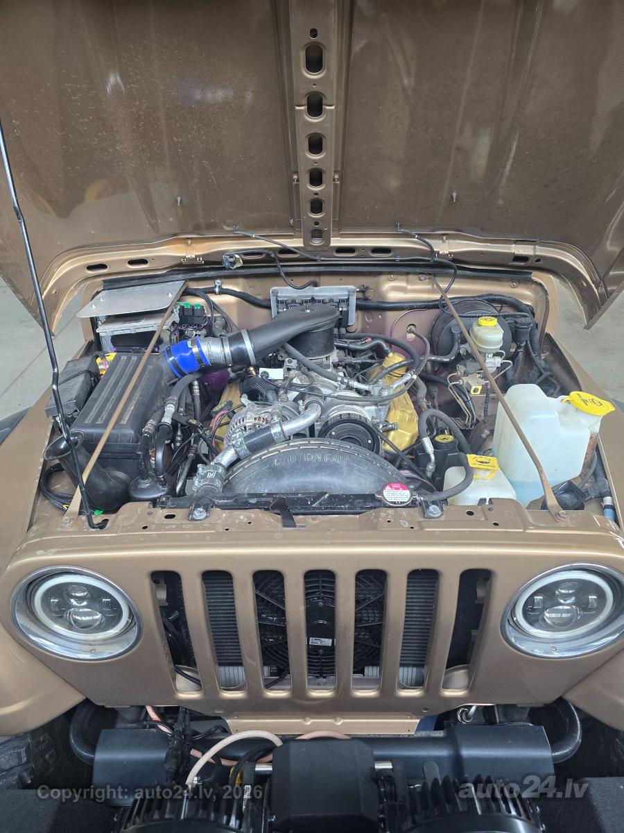 Brūns Jeep Wrangler 1997 Tallina, ar dzinēja tilpumu 5.20 L un nobraukumu 147 tūkst. km par 31000 €, foto 9 vietnē AUTOMOTO.COM.LV