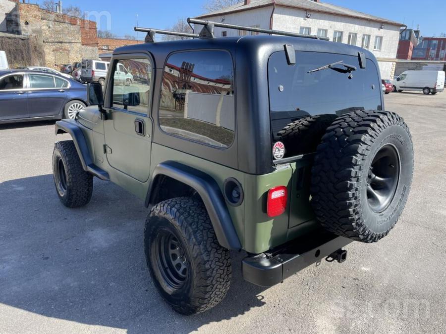 Zaļš Jeep Wrangler 1997 Rīga, ar dzinēja tilpumu 4.00 L un nobraukumu 305 tūkst. km par 13500 €, foto 3 vietnē AUTOMOTO.COM.LV