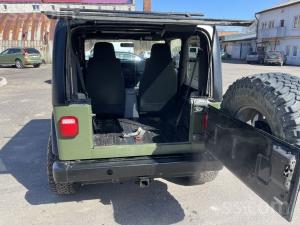 Zaļš Jeep Wrangler 1997 Rīga, ar dzinēja tilpumu 4.00 L un nobraukumu 305 tūkst. km par 13500 €, foto 7 vietnē AUTOMOTO.COM.LV