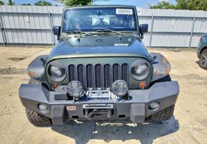 Zaļš Jeep Wrangler 2009 Kauņa, ar dzinēja tilpumu 3.78 L un nobraukumu 294 tūkst. km par 6999 €, foto 6 vietnē AUTOMOTO.COM.LV