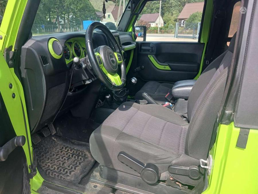 Zaļš Jeep Wrangler 2012 Kelmė, ar dzinēja tilpumu 3.60 L un nobraukumu 142 tūkst. km par 14600 €, foto 10 vietnē AUTOMOTO.COM.LV