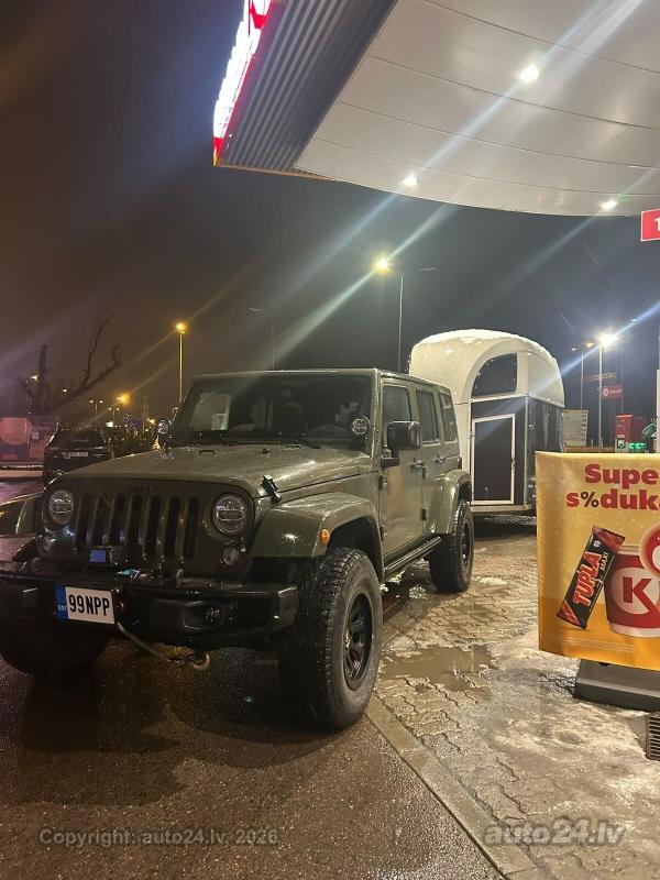 Jeep Wrangler 2015 in Tallinn on AUTOMOTO.COM.LV Green Jeep Wrangler 2015 in Tallinn, with an engine capacity of 2.80 L and mileage of 250 thousand km for 26780 €, photo 3 on AUTOMOTO.COM.LV